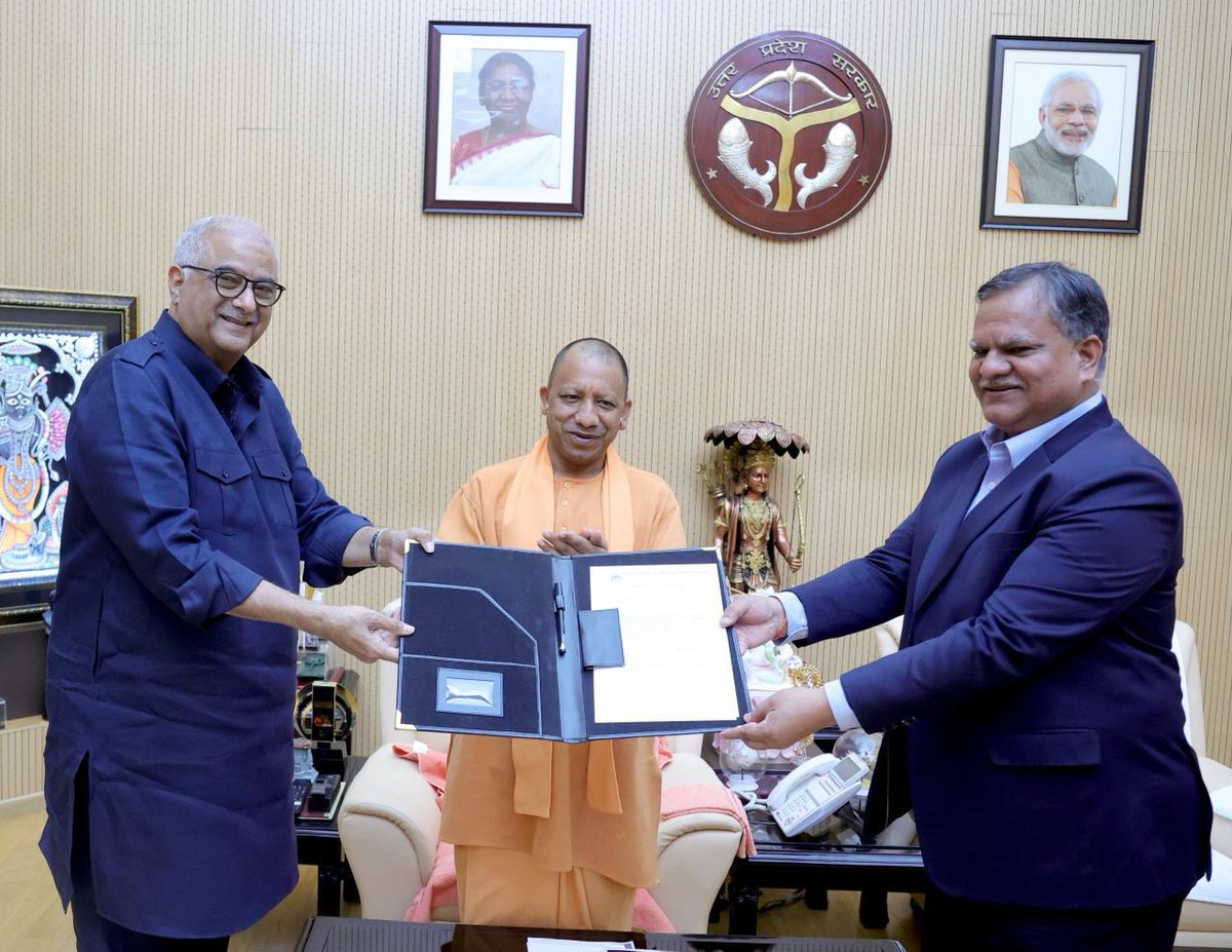 Uttar Pradesh Chief Minister Yogi Adityanath hands over the allotment ...