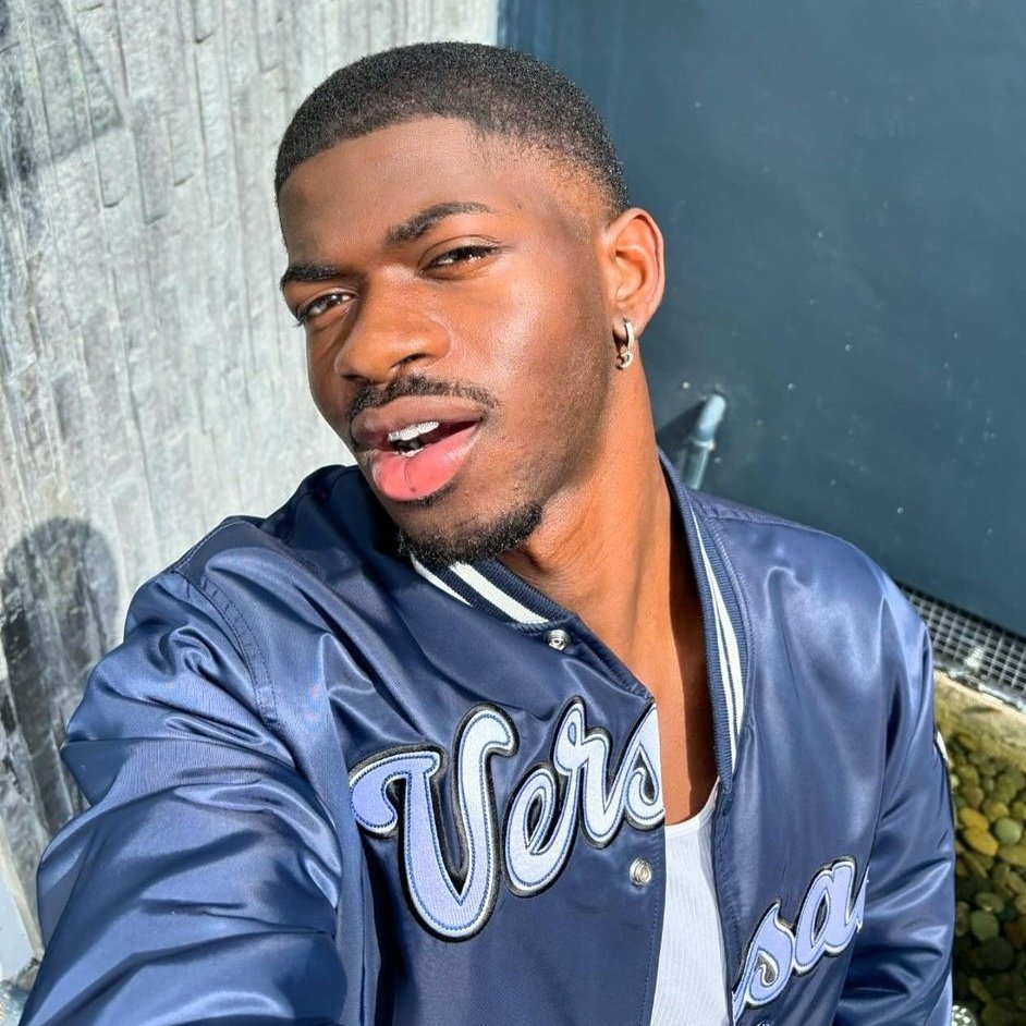 Fade With Part Haircut Nas