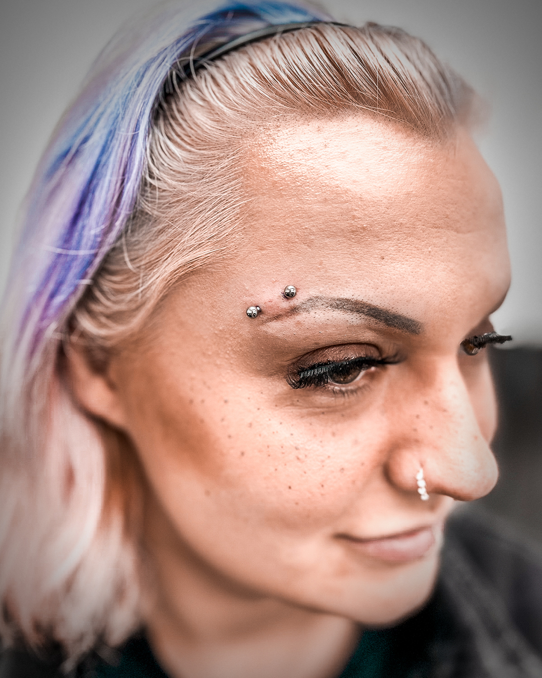 Horizontal Eyebrow Piercing