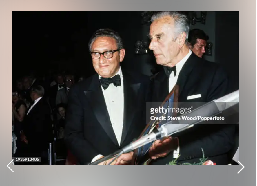"Prince Charles and Henry Kissinger attending the International Variety ...