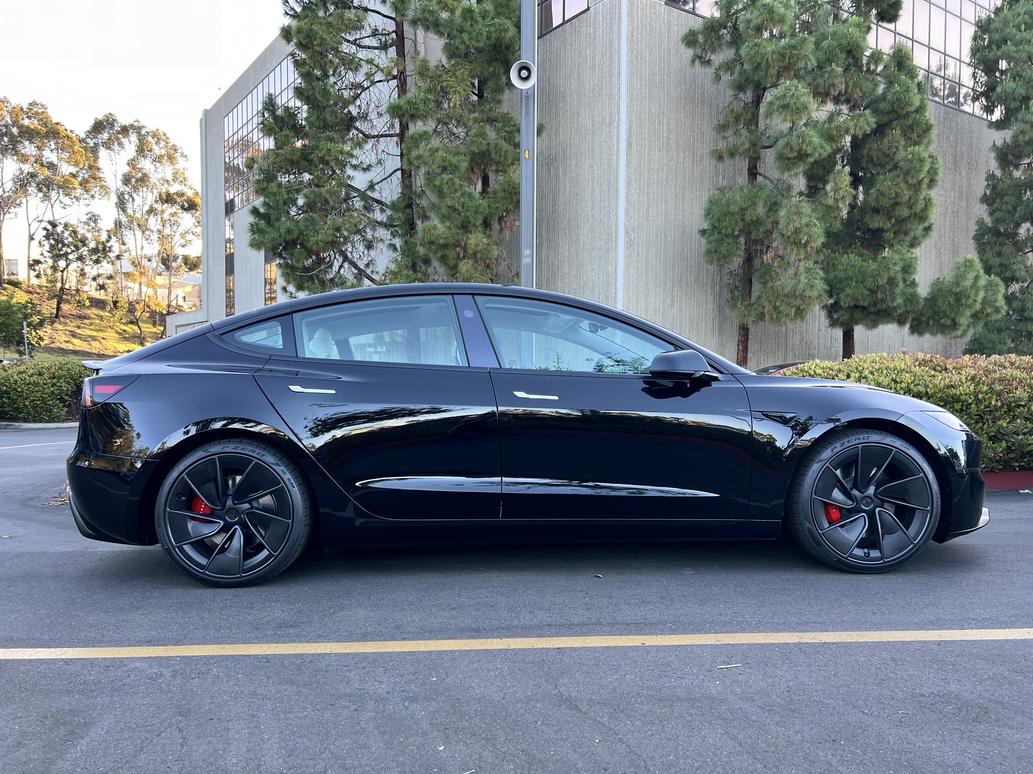 Tesla Newswire on X The Tesla upgraded Model 3 Performance looks stunning in Solid Black paint with a white interior https t tHJDPufYBU X