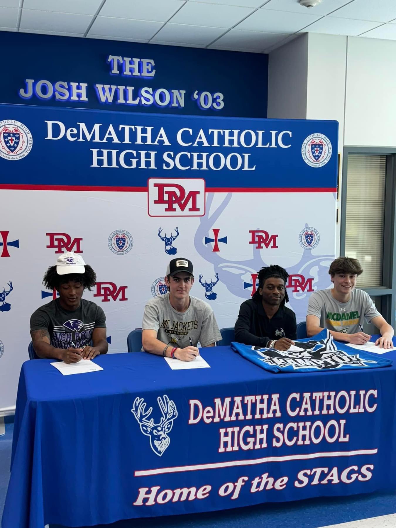 Dematha High School Logo