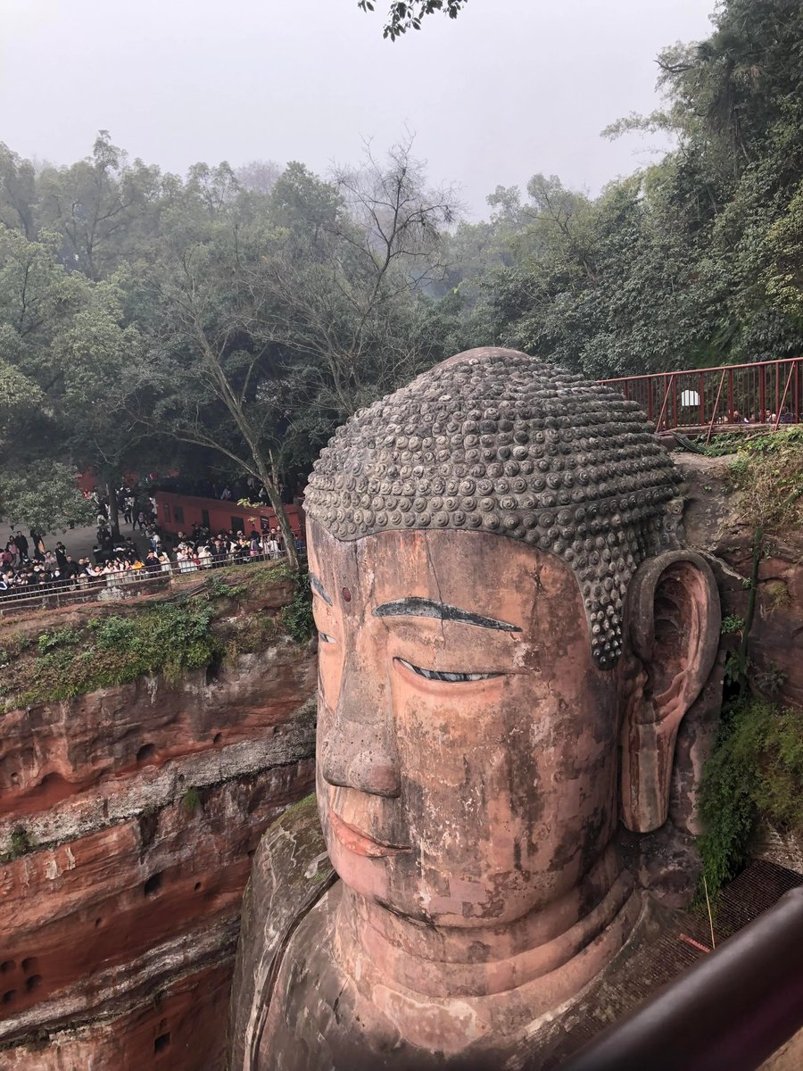 This is the Leshan Giant Buddha in China, carved into the cliffs to ...