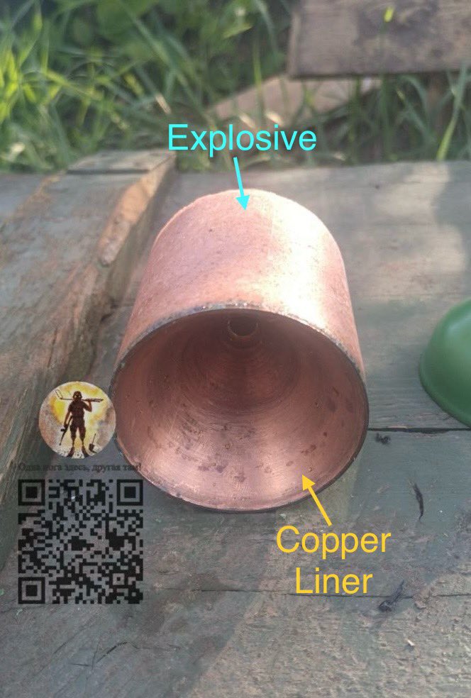 A finely made Ukrainian shaped-charge munition for dropping by drones ...