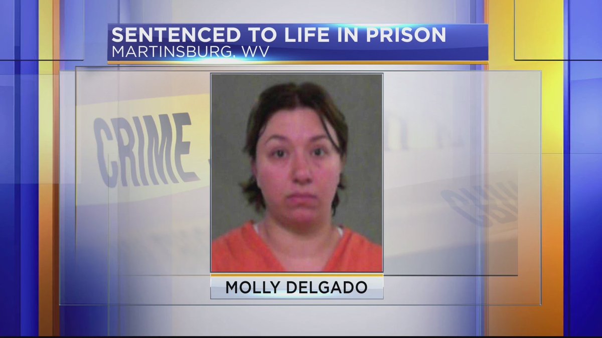 Molly, A woman in West Virginia, laid in bed with her two sons Delmer ...