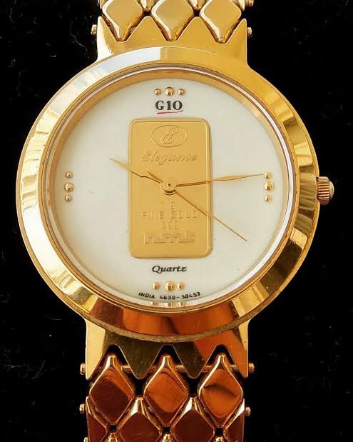 PM Indira Gandhi with a HMT watch. You know what is a wrist watch? It ...