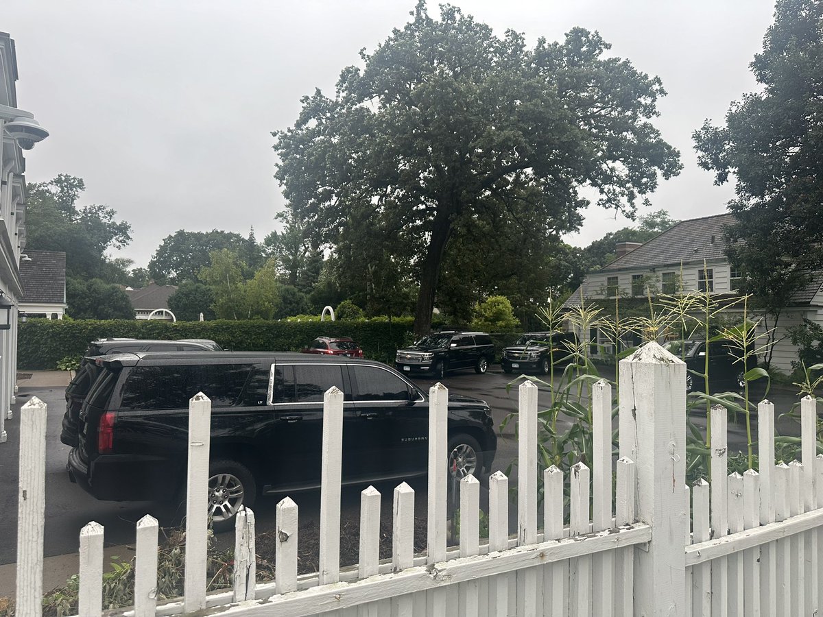 "I am live outside of the the Tim Walz residence. A bunch of black ...