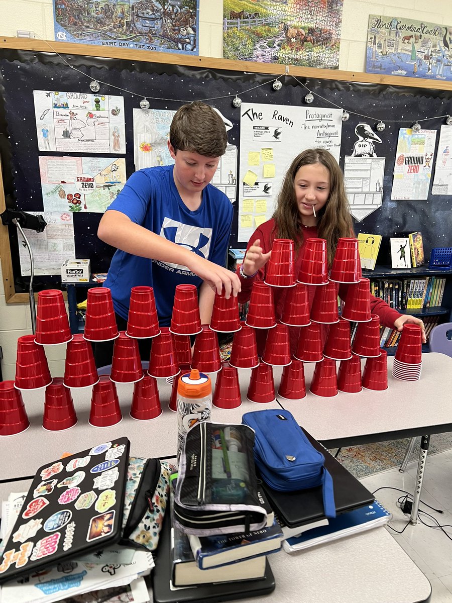 In check-out line with a few items behind someone with a full cart ...