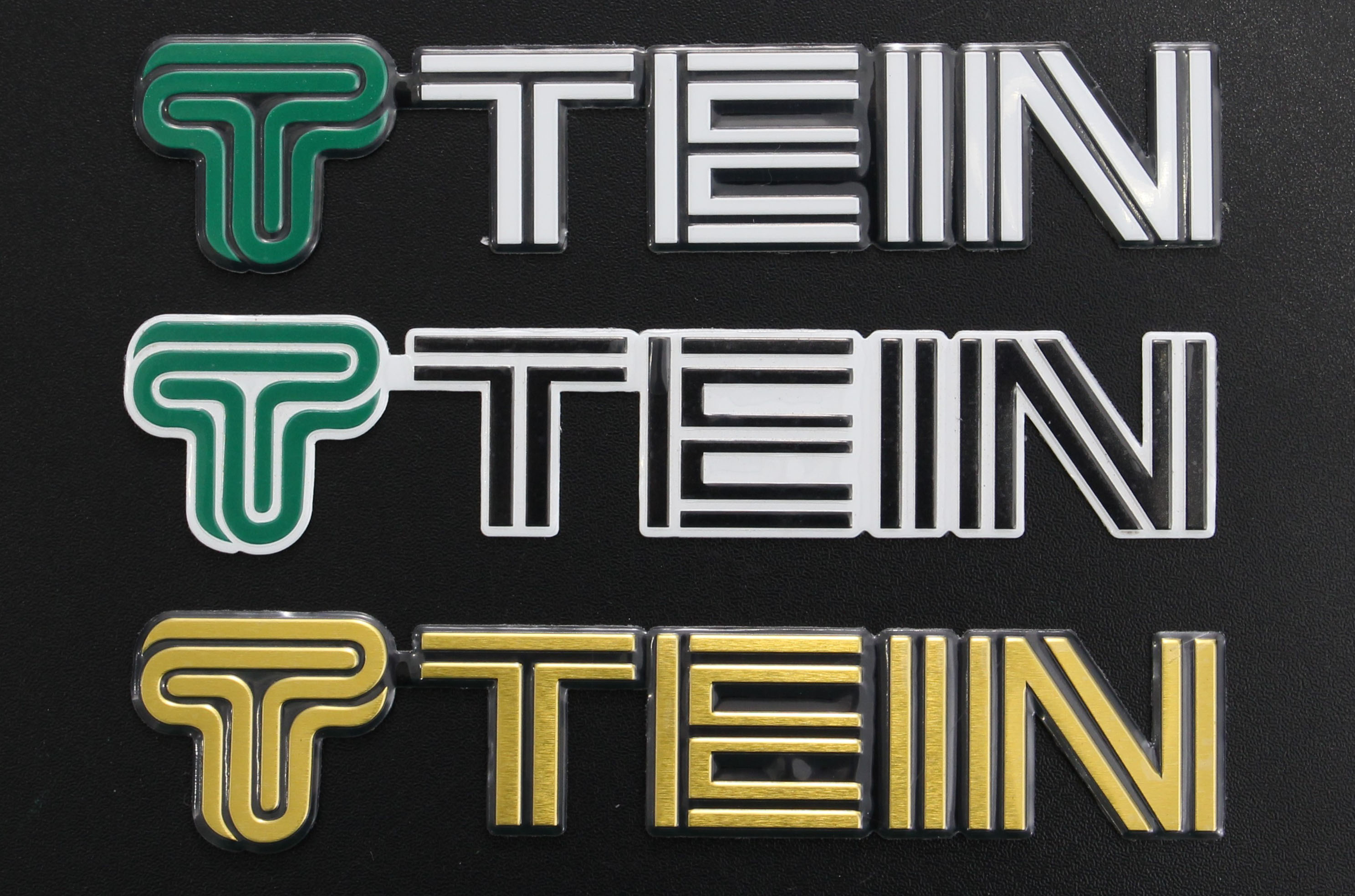 Tein Suspension Logo Aluminum Page With TEIN Logo, Length 7 Cm.