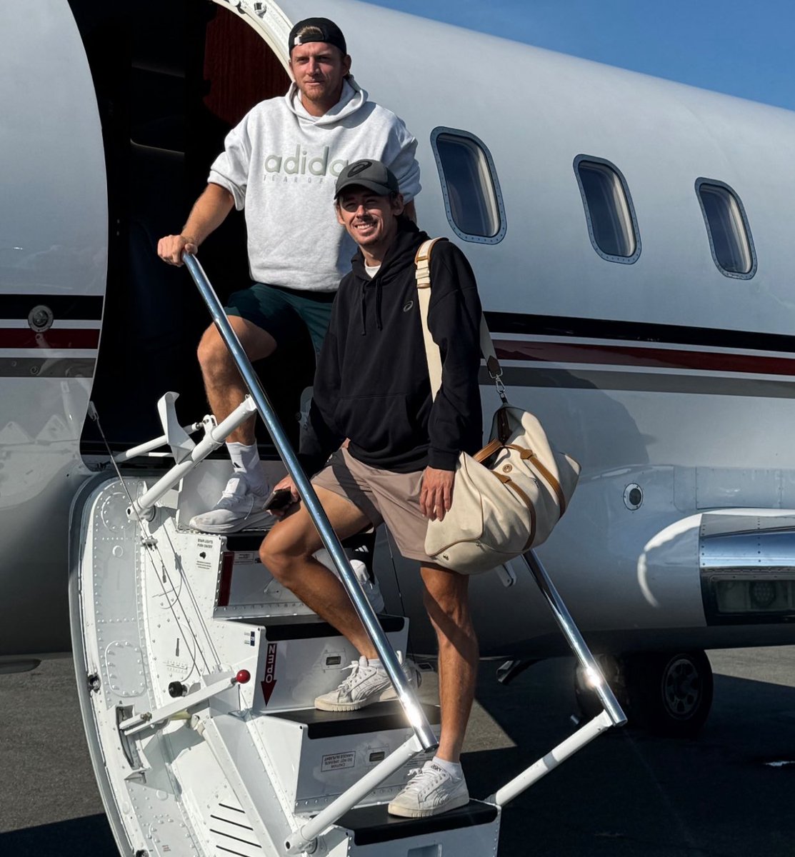 Alejandro Davidovich and Alex de Minaur flying together after the ...