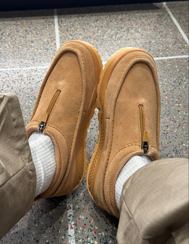 A reimagined 1990s outdoor shoe featuring a low-top, moccasin-inspired ...