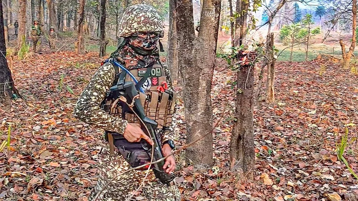 BSF operative wearing new digital camouflage suited to the background ...
