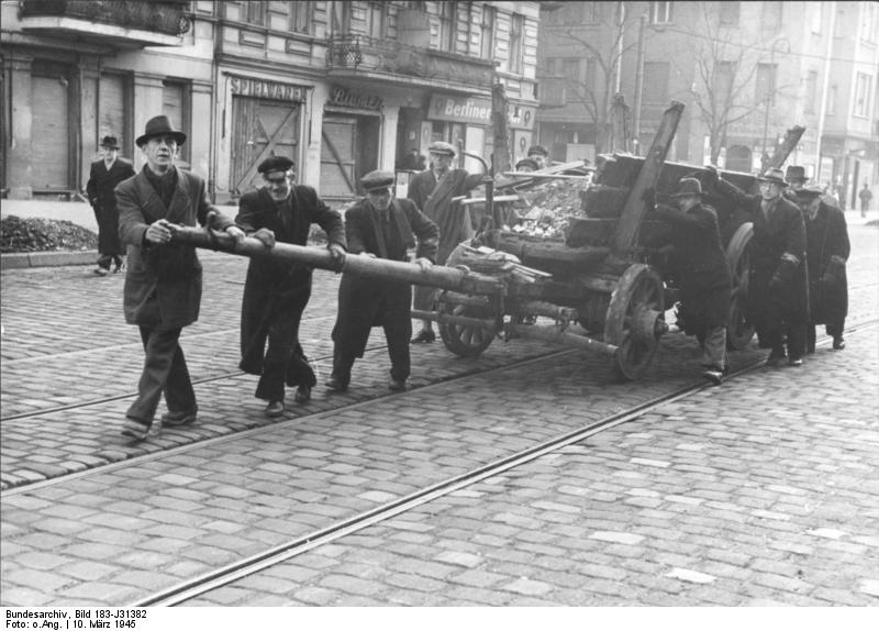 German civilians building a roadblock near the Hermannstraße S-Bahn ...