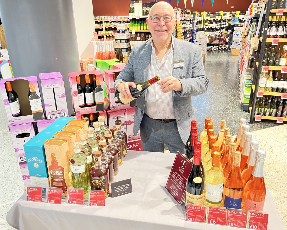 Steve is offering a taste of a variety of wines and spirits, including ...