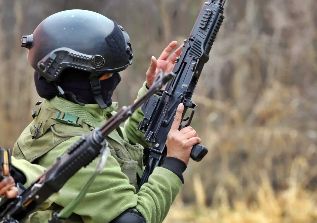 Indian CRPF operator with her AKM at the range. While primarily focused ...