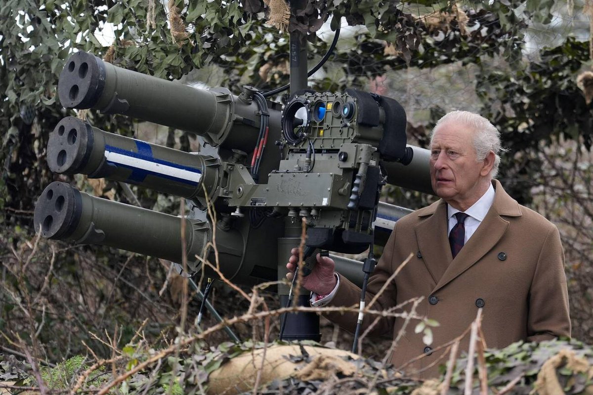 The King views a lightweight multiple launcher during a visit to the ...