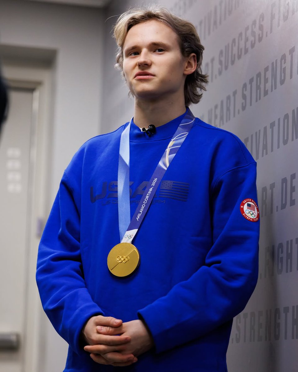 Ilia Malinin with his Olympic Team gold medal at the DICK's Sporting ...