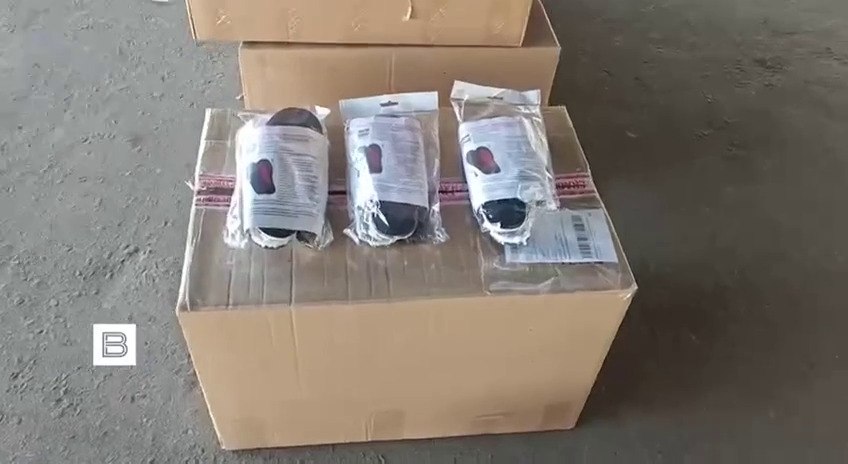 A covert network distributed explosive insoles containing 1.5 grams of ...