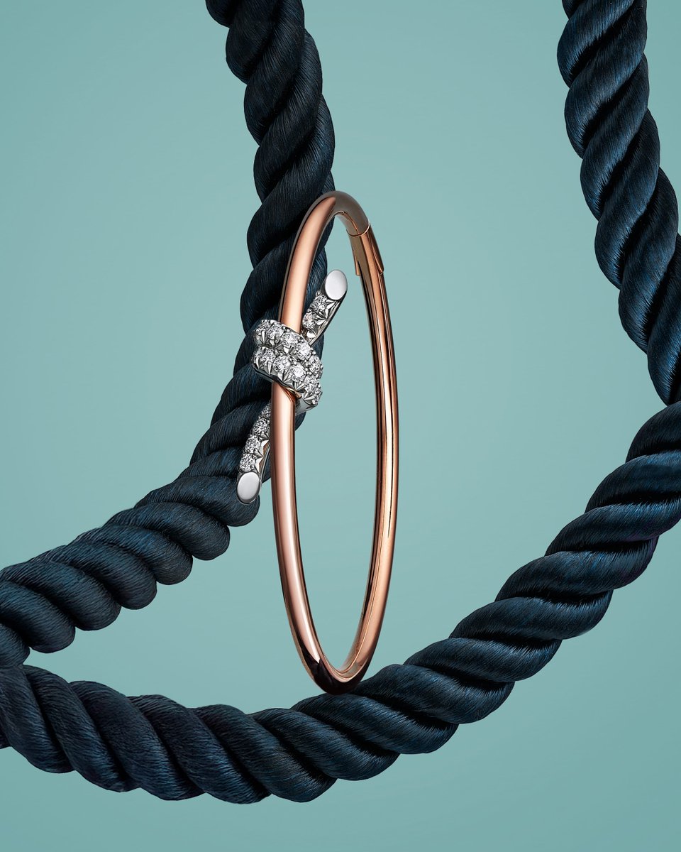 A symbol of love’s connections, this Knot by Tiffany design unites 18k ...