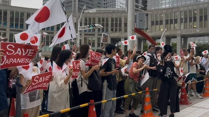 It's not "Save Japan" It's "Save JapanESE" A country is it's people.