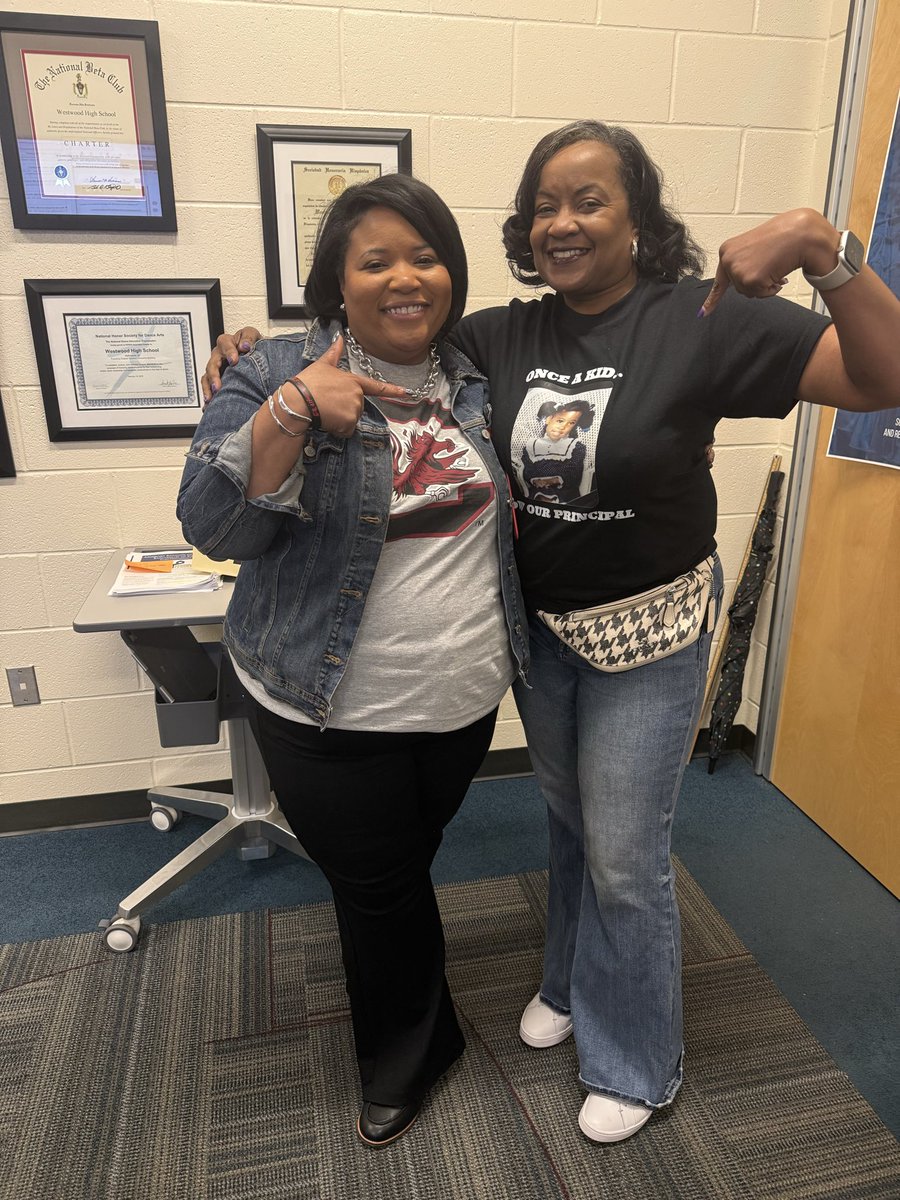What a FUN way to celebrate an Awesome Principal! We wore Her today ...