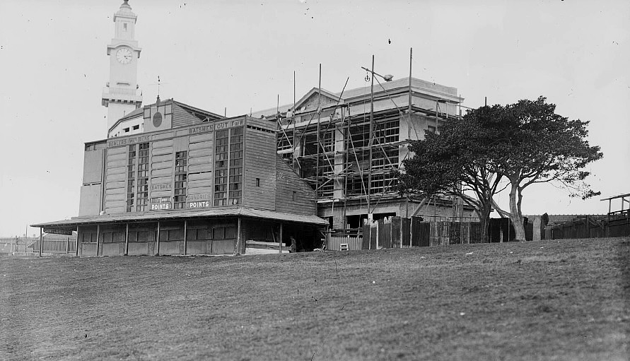 The iconic scoreboard at the SCG takes shape in 1924 behind the old Ned ...